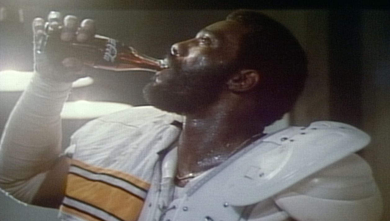 Coca-Cola's "Mean" Joe Greene Commercial from Super Bowl XIV in 1980 ...